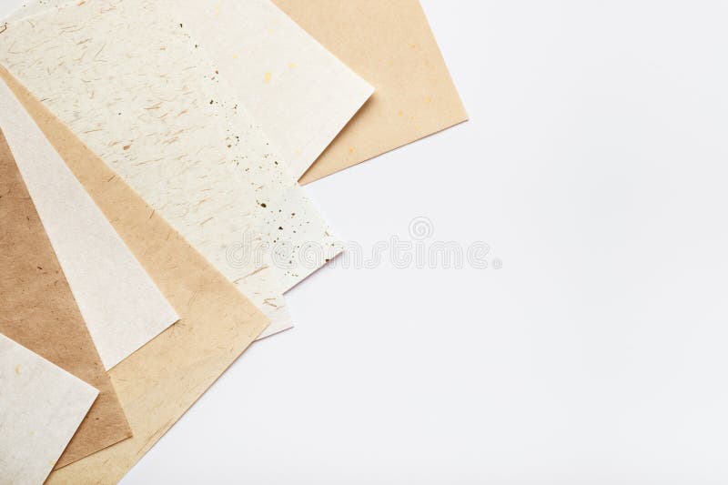 Stack of Different Handmade Paper on White Background Stock Image ...