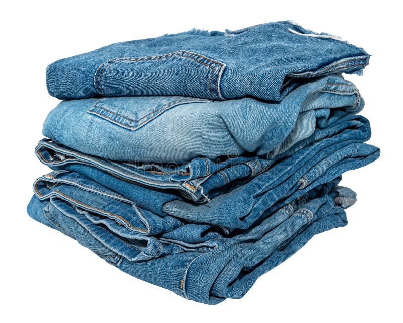 Stack of Different Jeans on a White Background. Denim Background ...
