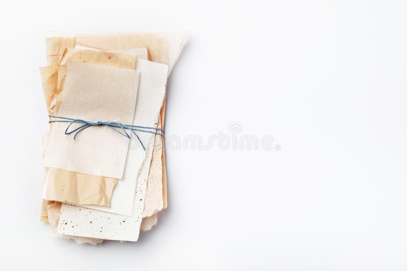 Stack of Different Pieces of Paper Tied with Blue Thread Stock Photo ...