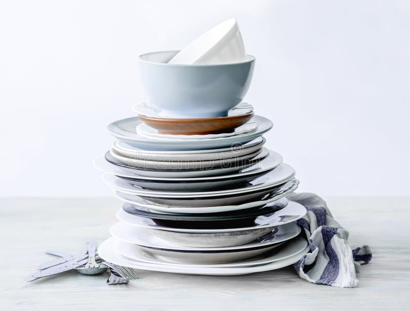 Stack of different plates stock photo. Image of dinnerware - 189349688