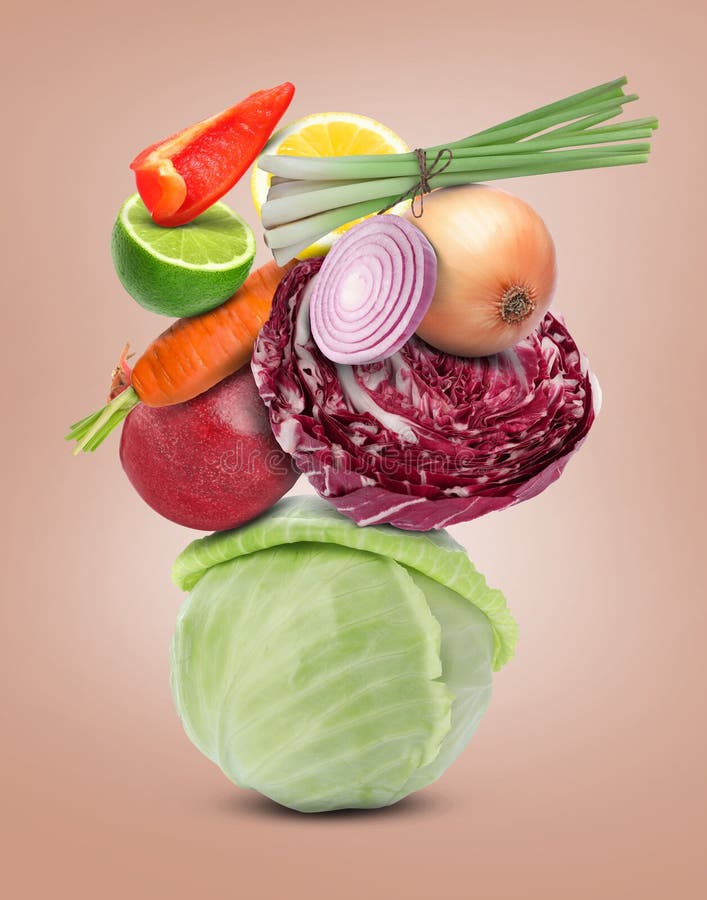 Stack of Different Vegetables and Fruits on Pale Pink Background Stock ...