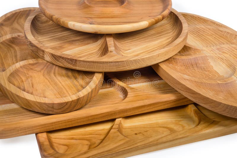 Stack of Different Wooden Compartment Dishes and Serving Boards Closeup ...