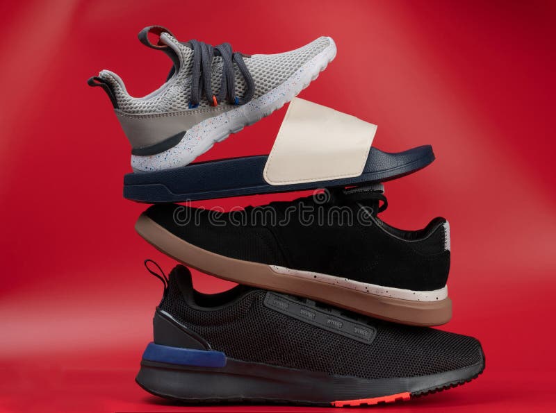 Stack of diffrent shoes stock photo. Image of sports - 304434324