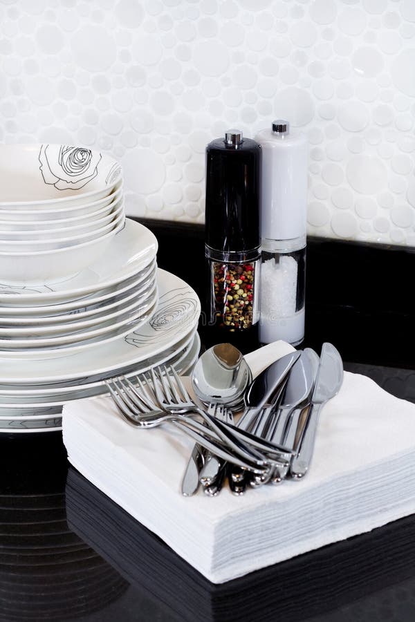 A stack of dinner plates stock photo. Image of pile, napkin - 18081598
