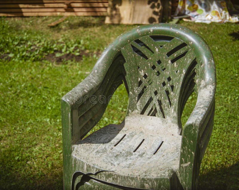 Stack of Dirty Plastic Chairs Stock Photo - Image of outdoors, cement ...