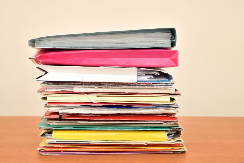 Stack of Document File Folders on the Brown Wooden Desk Stock Photo ... Stack of Document File Folders on the Brown Wooden Desk Stock Photo ...
