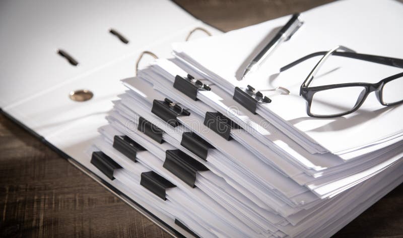 Stack of Documents, Eyeglasses and Pen on Table in Office Stock Image ...