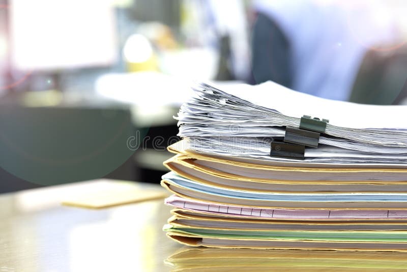 Stack of Documents in Files on Desk in Office Stock Photo - Image of ...