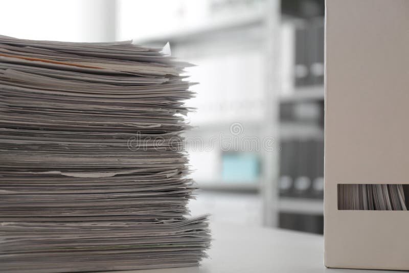 Stack of Documents and Folder with Papers on Table Stock Image - Image ...
