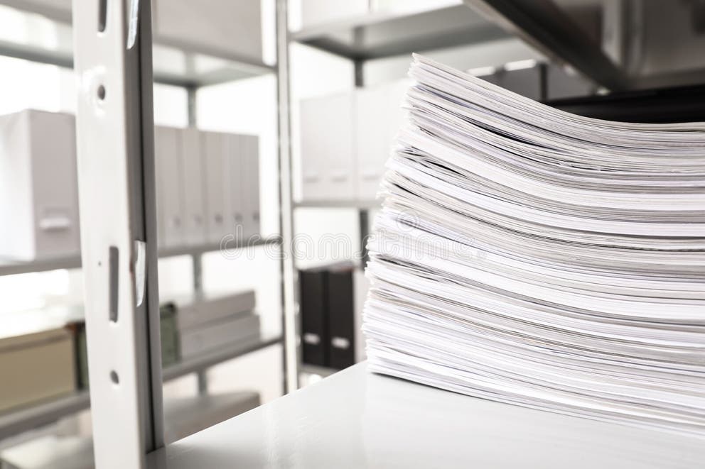 Stack of Documents on Shelf in Office Stock Photo - Image of ...