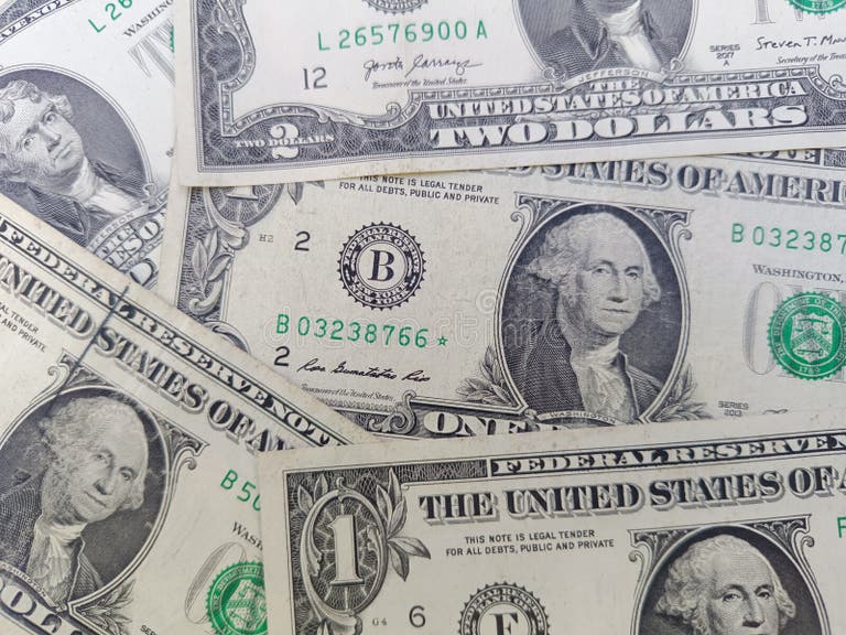 Stack of 1 Dollar and 2 Dollar US Banknotes. US Banknotes. Top View ...