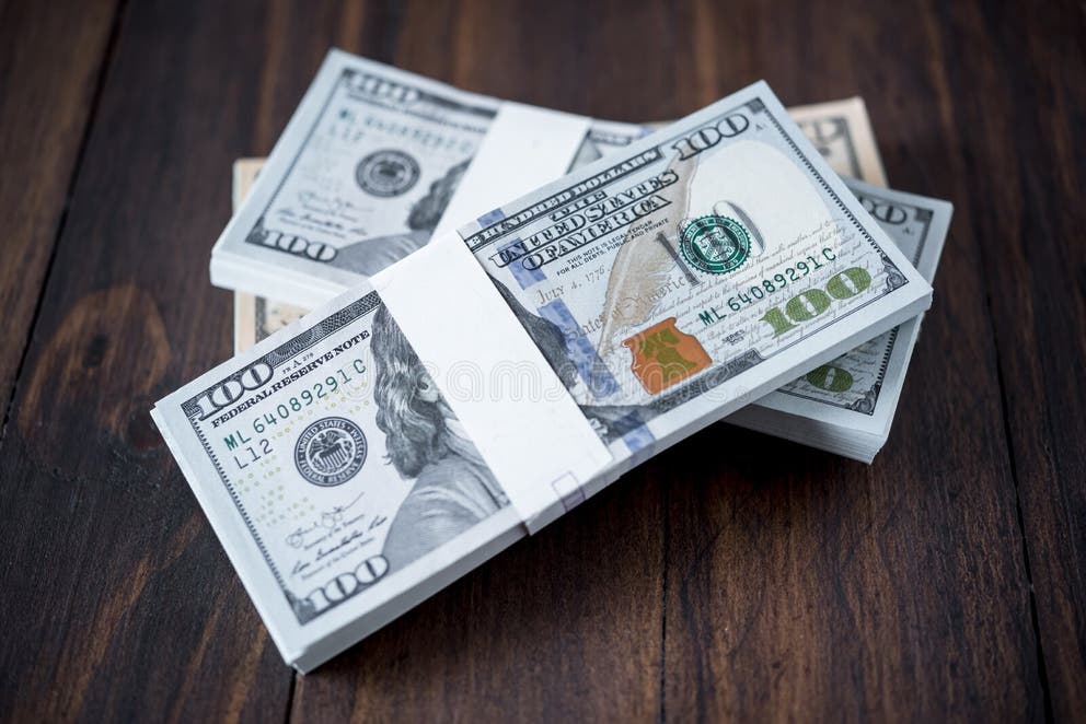 Stack of dollars wad money stock photo. Image of currency - 185240308