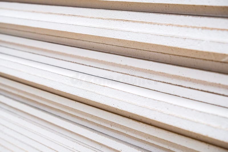 Stack of Drywall Plates Leaning Against a Wall Stock Photo - Image of ...