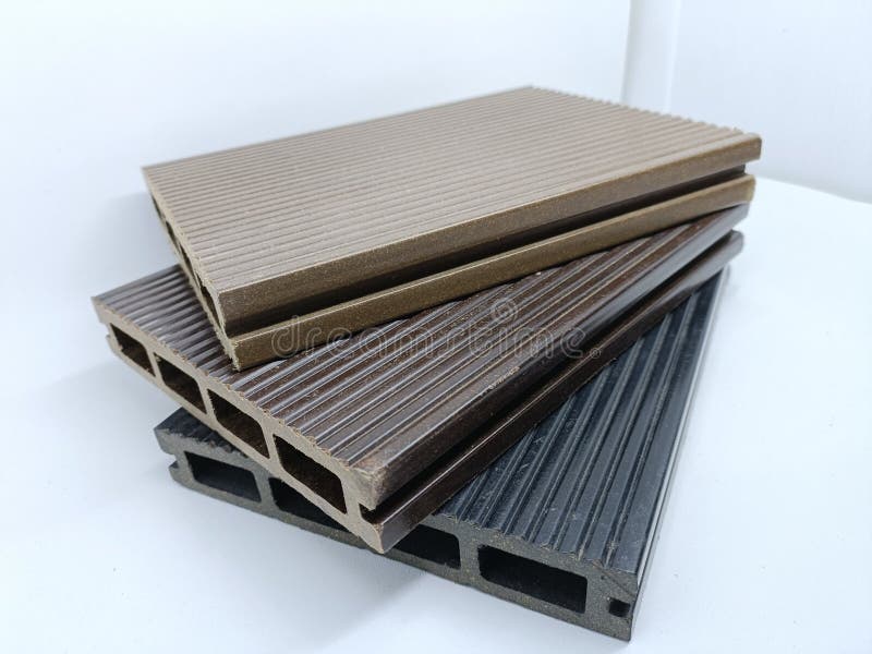 Stack of Grooved Composite Decking Panels in Various Colors on White ...