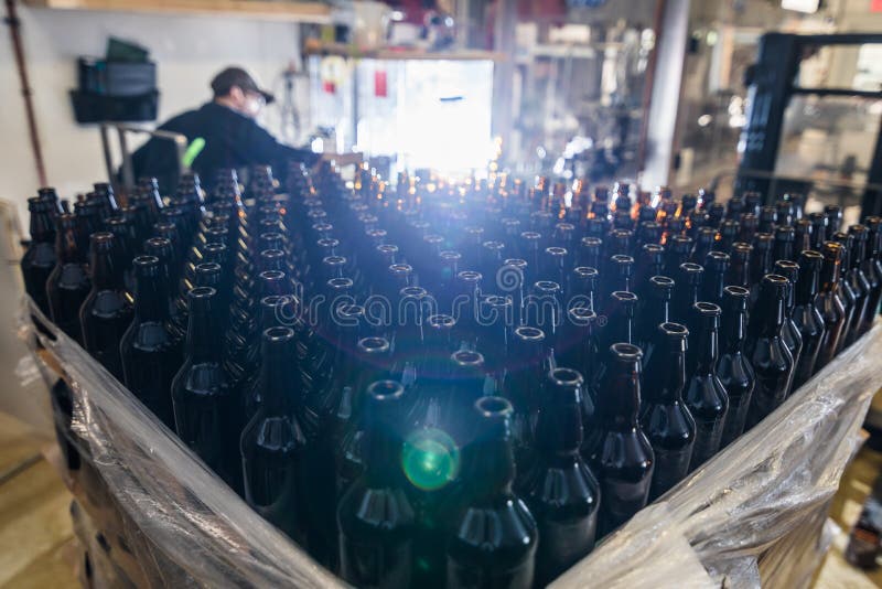 Stack of Empty Beer Bottles Stock Photo - Image of machinery ...