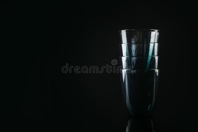 Stack of Empty Colorful Glasses on Black Background Stock Photo - Image ...
