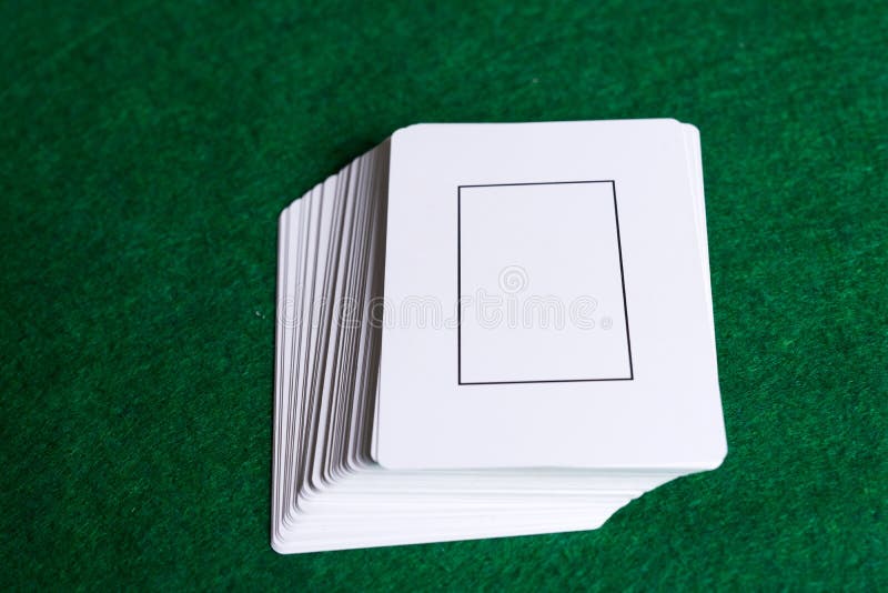 Stack of White Cards on the Green Table Stock Photo - Image of game ...