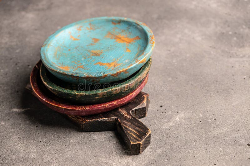 A Stack of Empty Wooden Trays and Plates on Gray Background. Place for ...