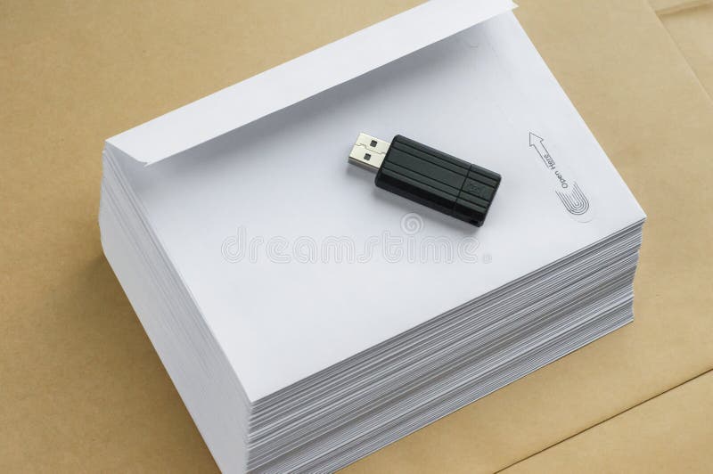 Stack Envelopes and Flash Drive Stock Image - Image of pile, blank ...