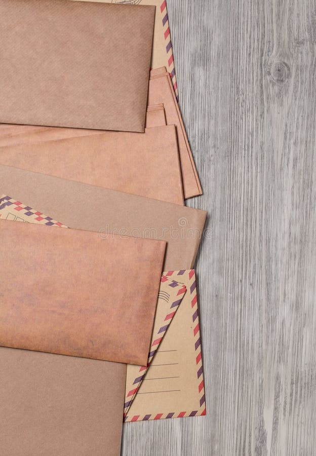 Stack of Envelopes on Wooden Stock Image - Image of wooden, envelope ...