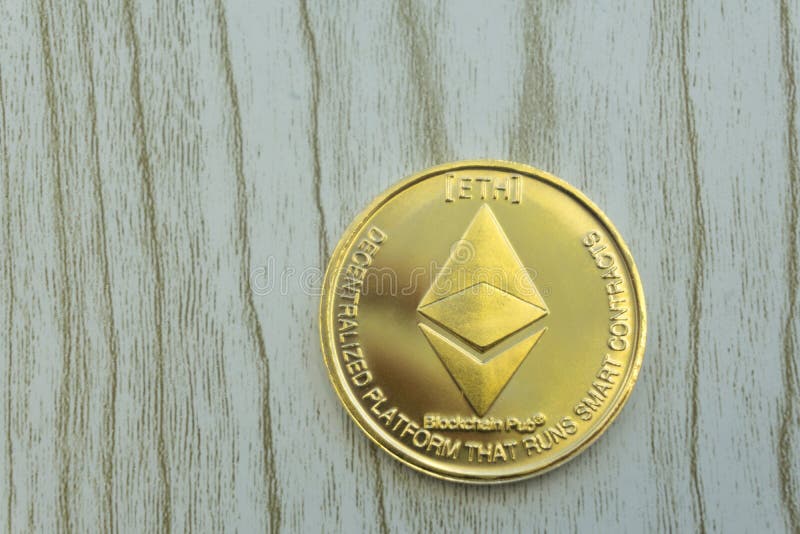 Stack of Ether Coins or Ethereum on Gold Background To Illustrate ...
