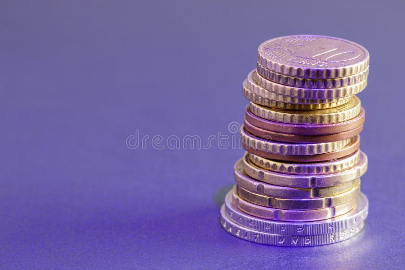 Stack of Euro Coins Illuminated with Blue Light. Money Concept with ...