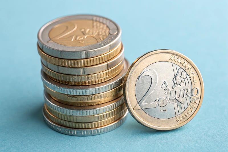 Stack of Euro Coins on Light Blue Background, Closeup-generated by Ai ...