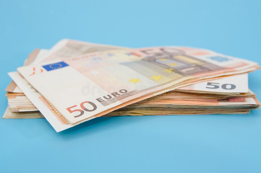 Stack with 50 Euros on a Blue Background. Stock Image - Image of ...