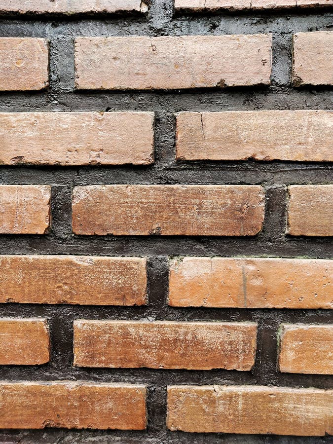Stack of Exposed Bricks Wall Stock Image - Image of black, texture ...