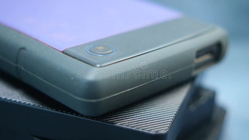 Stack of External Hard Drives on Table Stock Footage - Video of black ...