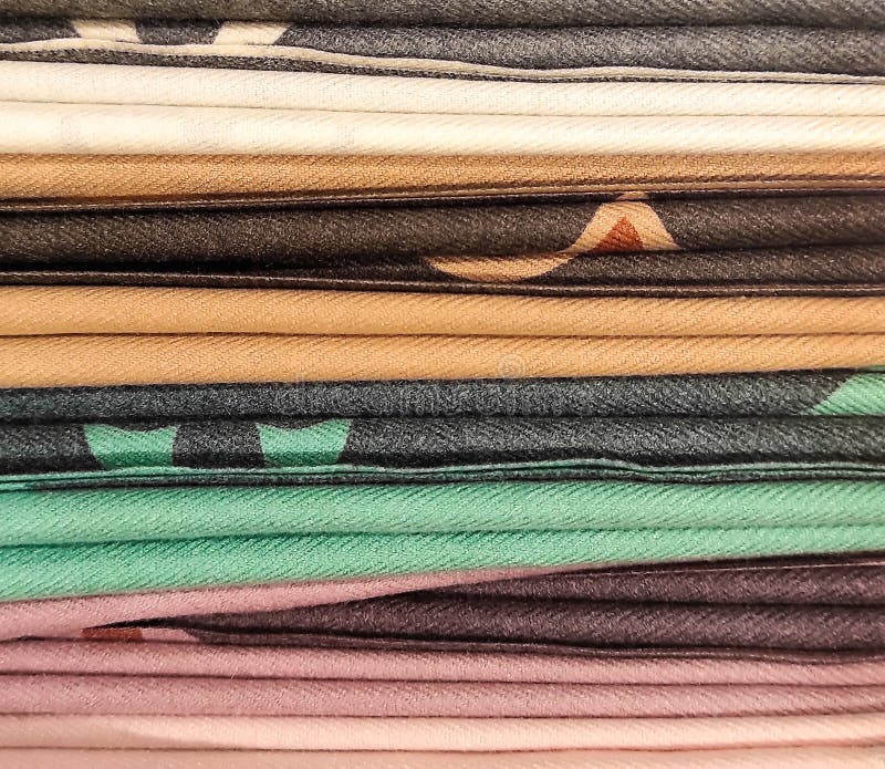 Stack of fabric scarves stock photo. Image of green - 200897534