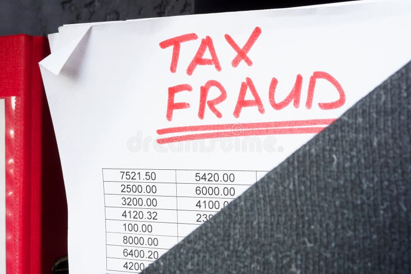 Stack of Financial Papers Labeled Tax Fraud. Issues with Tax Compliance ...
