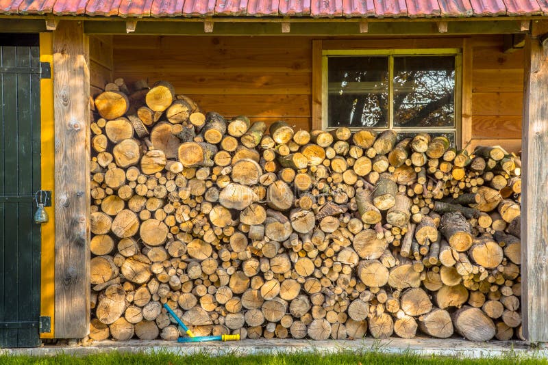 Stack of Firewood in a Barn Stock Photo - Image of rustic, energy: 89934428