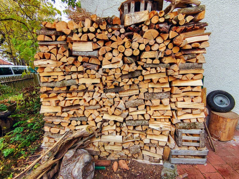 Stack of Firewood in Front of a House Stock Image - Image of structure ...