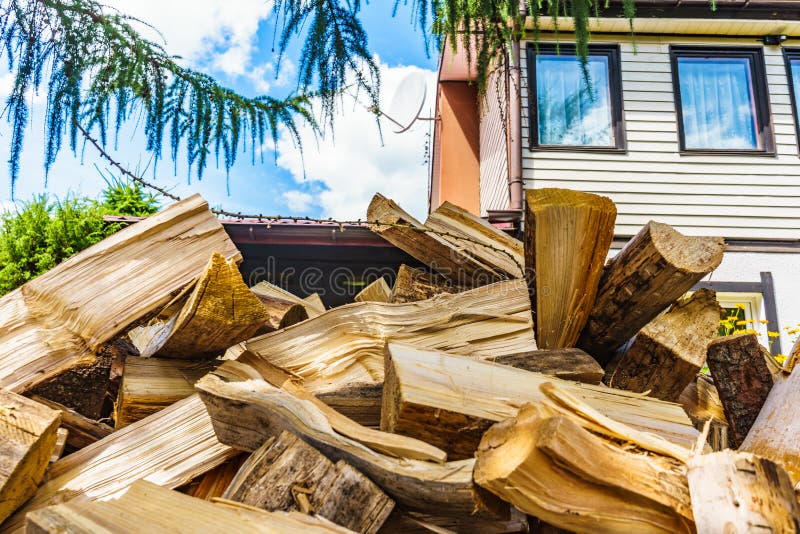 Stack of firewood at house stock image. Image of wood - 226954445