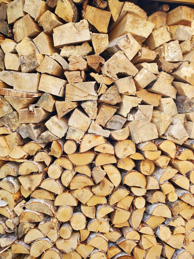A Stack of Firewood, Log Ends, Chopped Birch and Pine Firewood ...