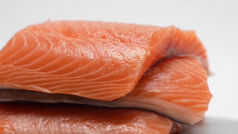 Stack of Fish Fillets Rotating on a White Background. Stock Footage ...