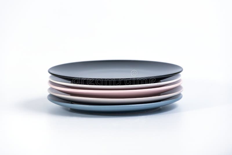 Stack of Colorful Plates Isolated on White Background Stock Image ...