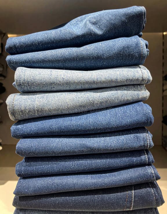 Stack of Folded Blue Denim Jeans on Display in Clothing Retail Store Stock Illustration ...