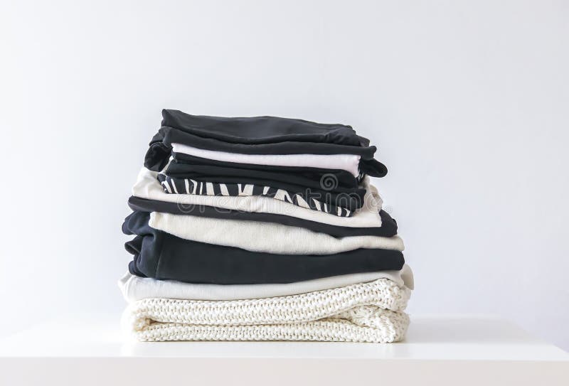 Stack of Folded Colorful Clothes. Compact Storage Organizing Stock ...