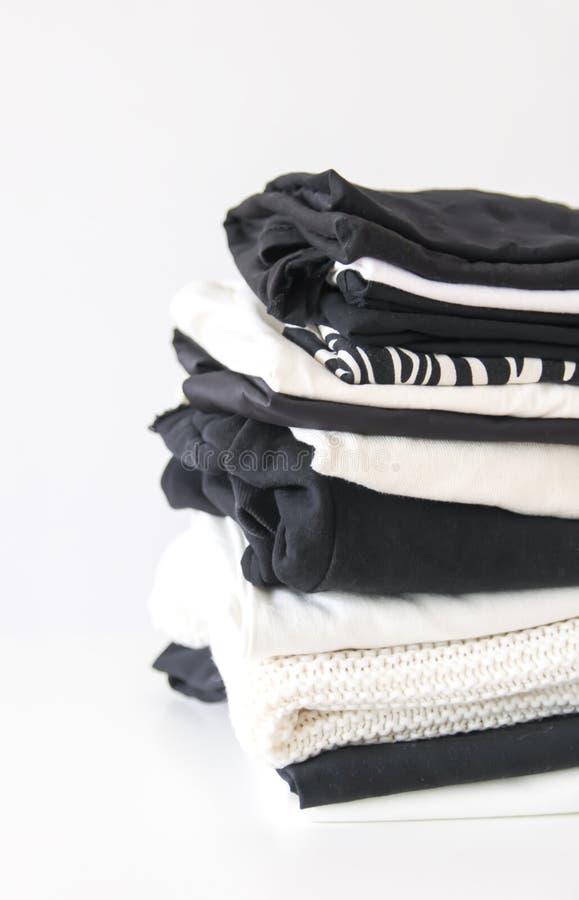 Stack of Folded Colorful Clothes. Compact Storage Organizing Stock ...