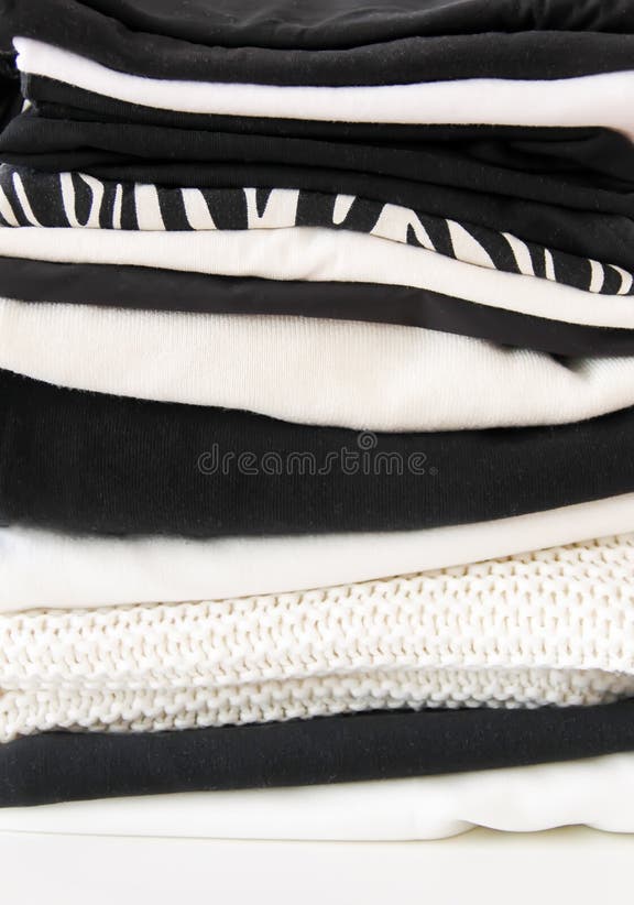 Stack of Folded Colorful Clothes. Compact Storage Organizing Stock ...