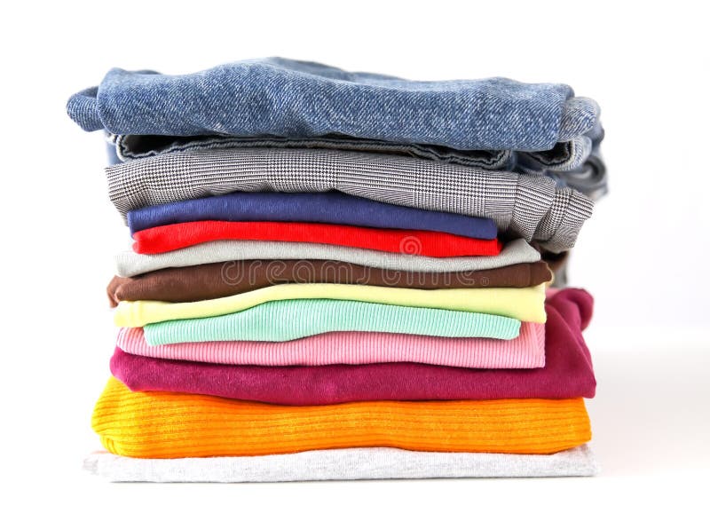 Stack of Folded Colorful Clothes. Compact Storage Organizing Stock ...