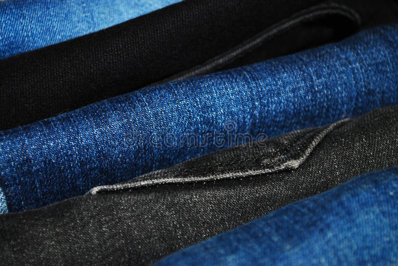 A Stack of Folded Denim Pants Close-up Stock Photo - Image of store ...