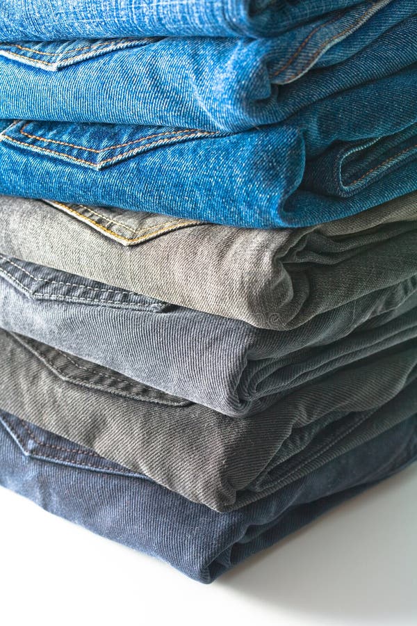 Stack of folded jeans stock image. Image of fashion, apparel - 12678521