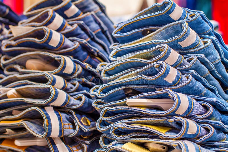 Stack of Folded Jeans in the Store Stock Image - Image of fashion ...