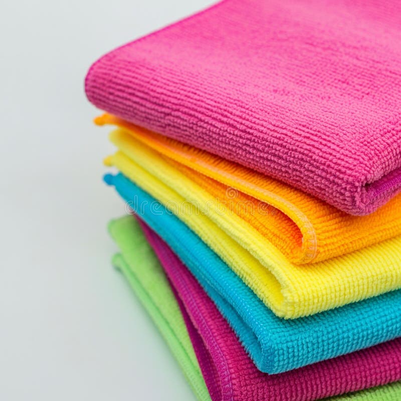 A Stack of Folded Microfiber Cloths in Vibrant Colors: Pink, Orange ...