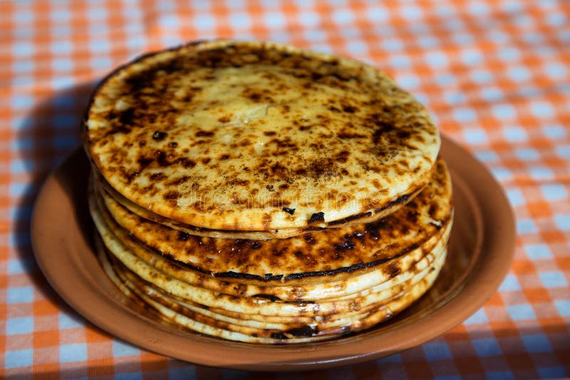 A Stack of Folded Pancakes. Thick Pancakes from the Oven on a Plate ...