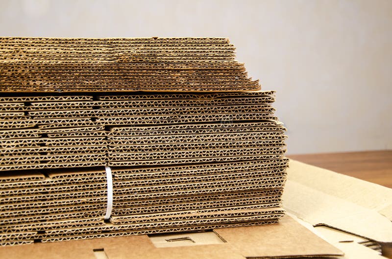 Stack of Folded Sheets of Corrugated Cardboard. Recycled Materials ...