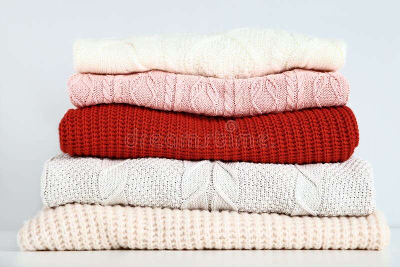 Folded sweaters stock photo. Image of cashmere, heap - 132679164